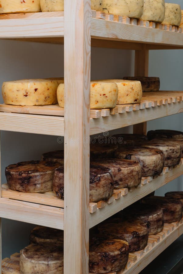 Cheese Stacked on Shelves in a Cheese Farm Stock Image - Image of dairy ...