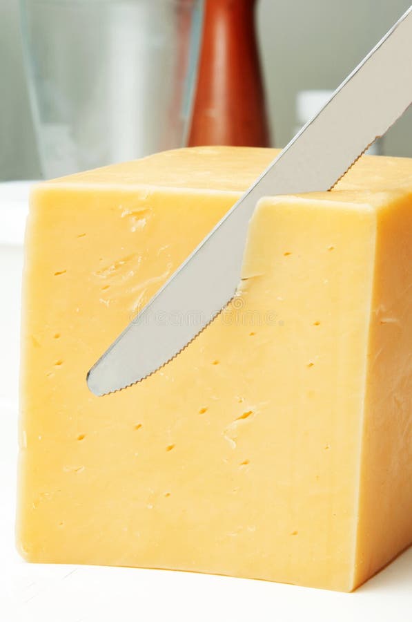 Cheddar Cut into Blocks on a Brown Plate. Stock Image - Image of mature ...