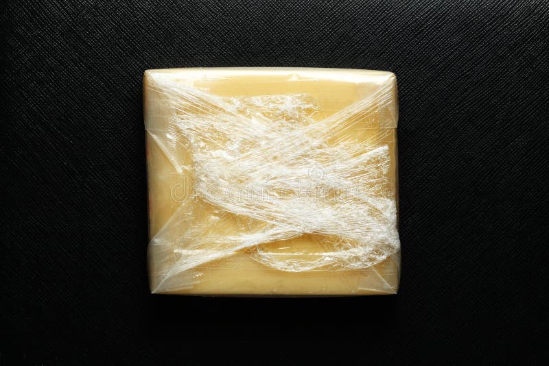 Cheese in plastic sealed. stock photo. Image of cheese - 113473822