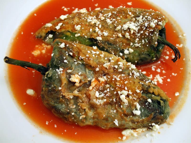 Cheese Topped Chile Rellenos Stock Image - Image of food, crumbled: 6071161