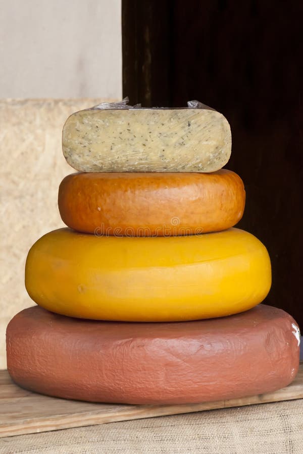 Cheese wheels stock image. Image of food, pile, wheel - 1276659