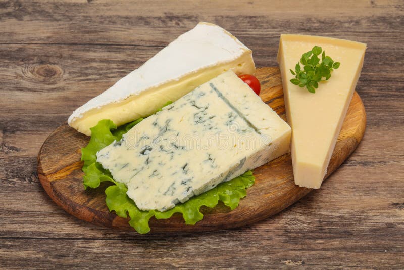 Cheese Triangle Mix - Gorgonzola, Brie, Parmesan Stock Photo - Image of ...