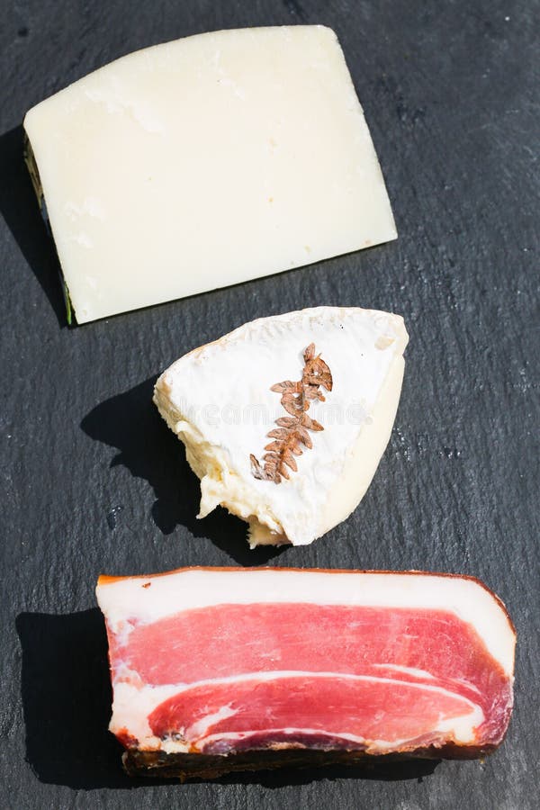 Cheese and Tyrolean Bacon on Slate, Pecorino, French Soft Cheese Stock ...
