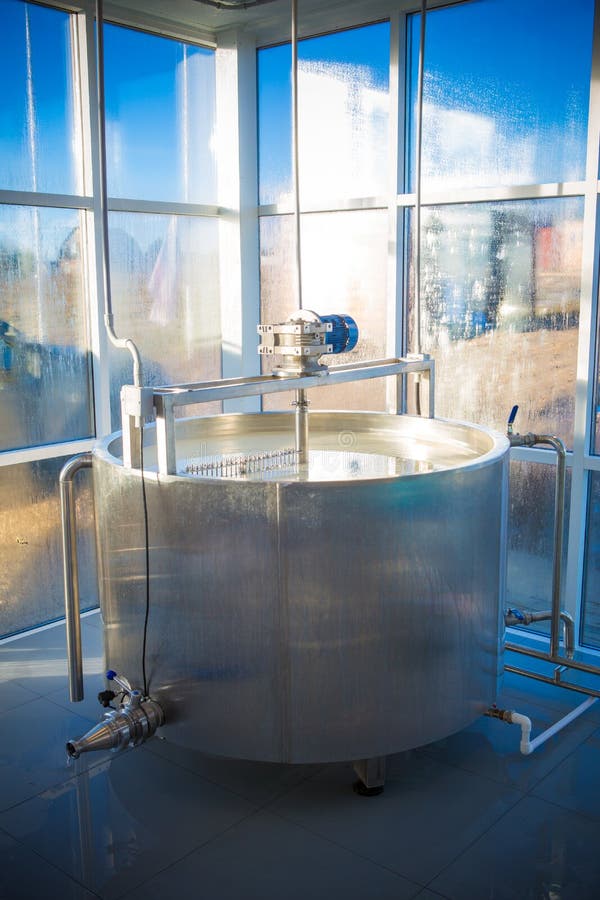 Cheese vats in the dairy stock photo. Image of milk - 136870860