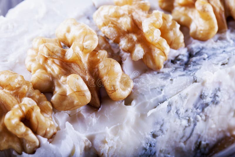 Cheese with walnuts stock photo. Image of cheese, boats - 64291516