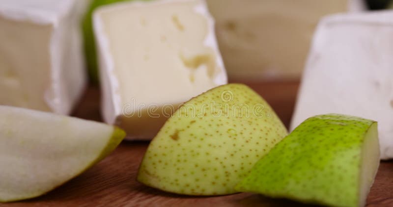 Cheese with White Mold Cut into Chunks Stock Footage - Video of milk ...