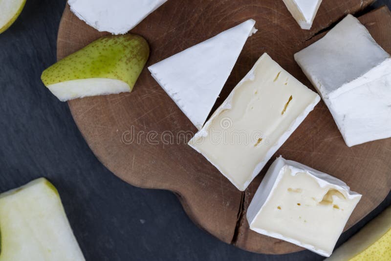 Cheese with White Mold Cut into Chunks Stock Image - Image of portioned ...