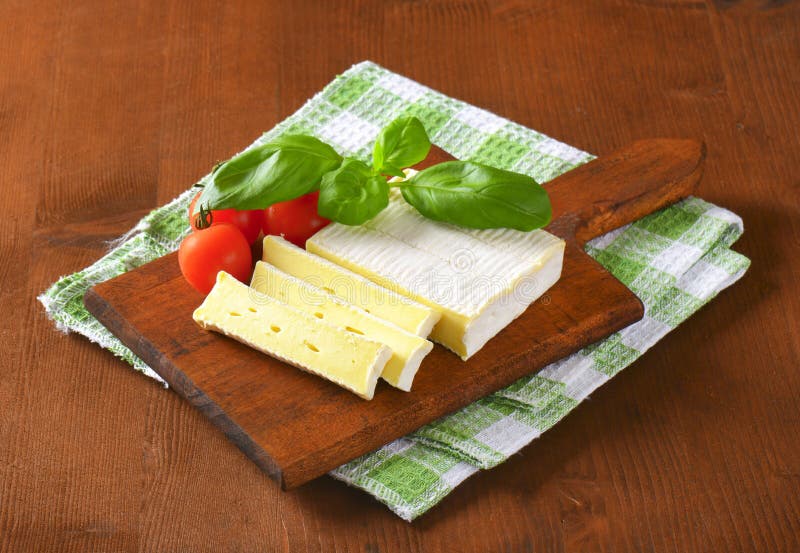 Cheese with white rind stock image. Image of dishtowel - 73262365