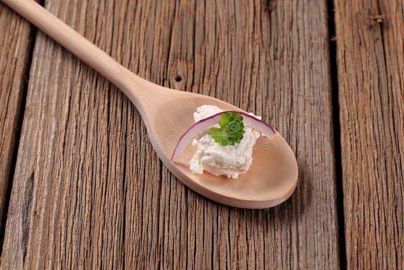 Cheese on wooden spoon stock photo. Image of fresh, spoon - 35636798