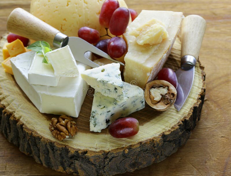 Cheeseboard with Assorted Cheeses Stock Photo - Image of camembert ...