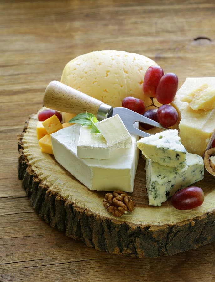 Cheeseboard with Assorted Cheeses Stock Photo - Image of brie, plate ...