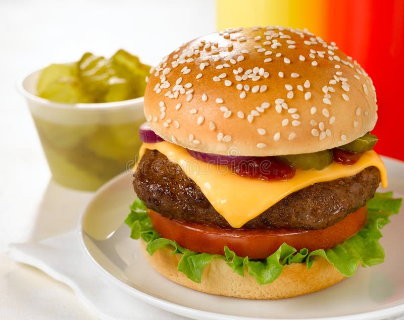 Cheeseburger stock image. Image of pickles, onions, sesame - 14045331
