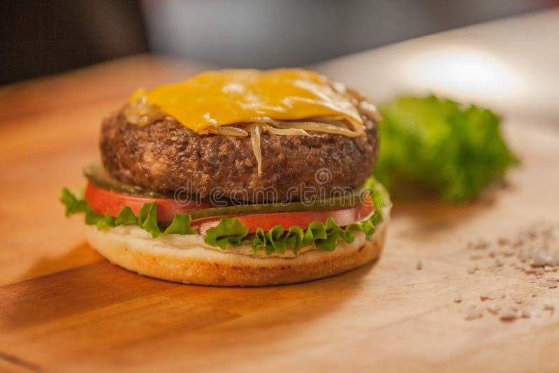 Cheeseburger with Mayonnaise, Mustard and Ketchup on White Bowls and ...