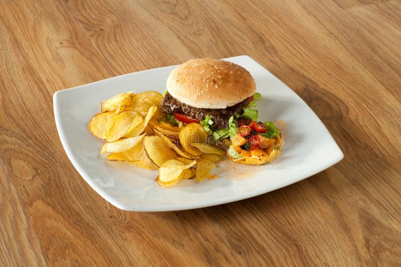 Cheeseburger with Chips on a Plate Stock Image - Image of potato, lunch ...