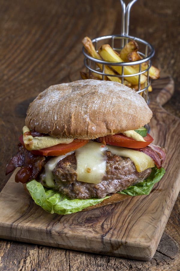 Cheeseburger with fries stock image. Image of cheeseburger - 258060757