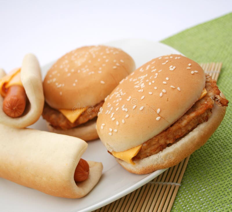 Cheeseburger and Hot Dogs stock image. Image of lunch - 32135679