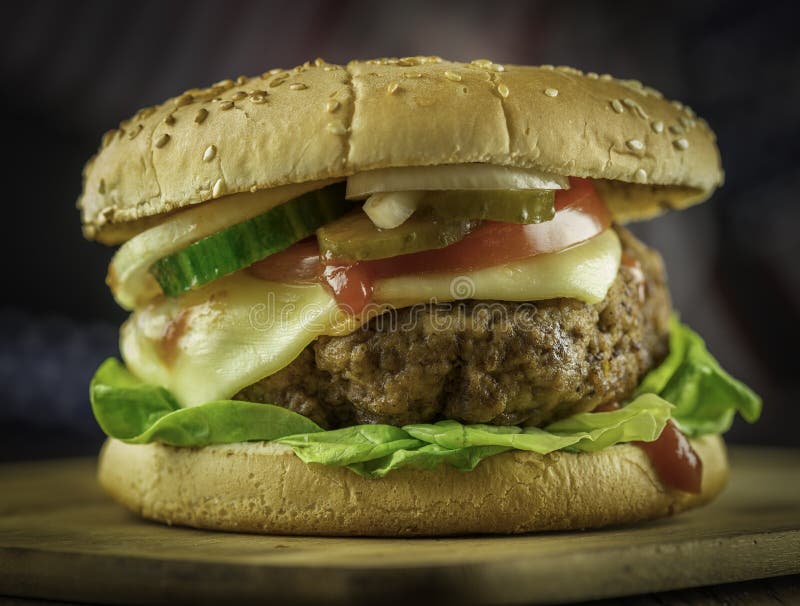 Big Cheeseburger stock photo. Image of buns, plate, hamburger - 25678364