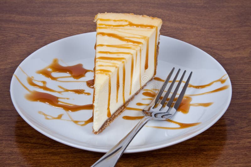 Cheesecake with Caramel Drizzled Stock Photo - Image of fork, calories ...