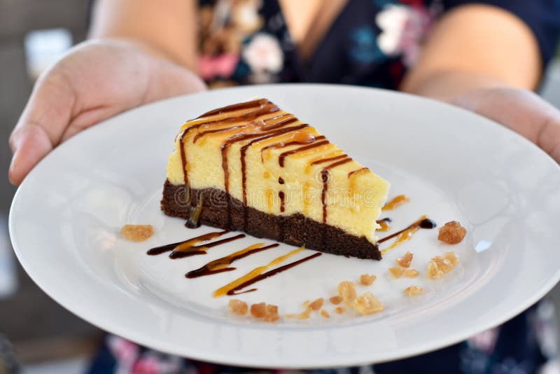 Cheesecake with Cubes of Sugar in a White Plate. Stock Image - Image of ...