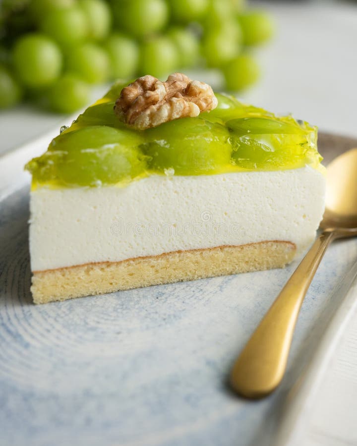 Cheesecake with Grapes on a Sponge Cake Base. Stock Photo - Image of ...