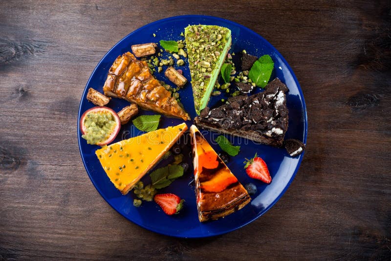 Cheesecake Mix, Assorti of Cheesecakes with Toppings and Fresh Berries ...