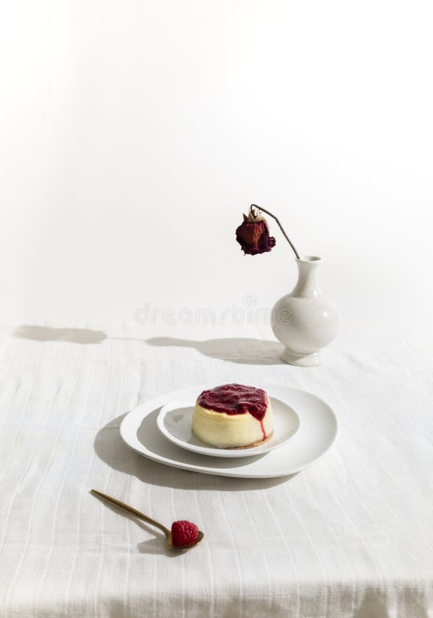 Cheesecake with Raspberry Jam and Coffee on a Minimalist Table, Stock ...
