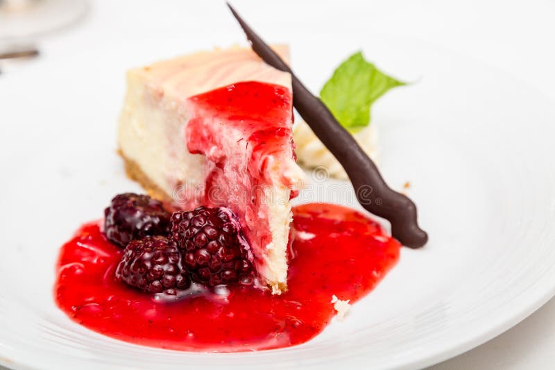 Cheesecake with Raspberry Sauce Stock Image - Image of berry, dessert ...