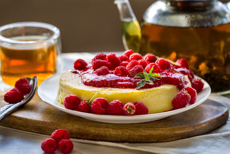 Cheesecake with Raspberry Sauce Stock Photo - Image of pastry ...