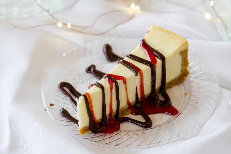 Cheesecake Slice with Drizzled Sauce Stock Photo - Image of close ...
