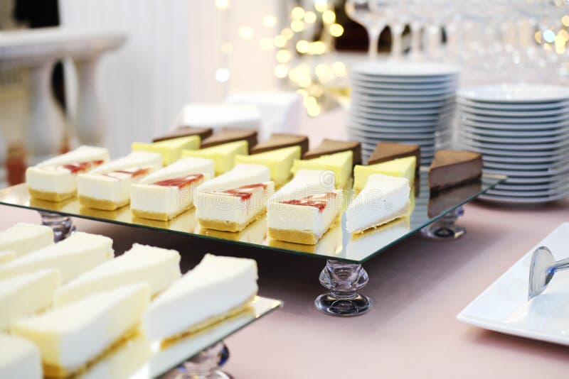 Cheesecakes on a Mirrored Tray Stand on the Buffet Table Stock Image ...
