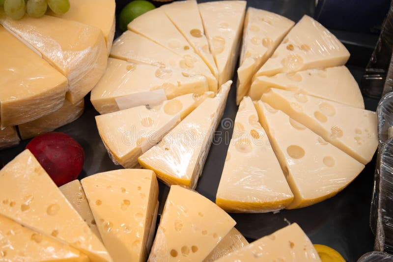 Cheeses on the Counter of a Small Store . Close Up View Stock Photo ...