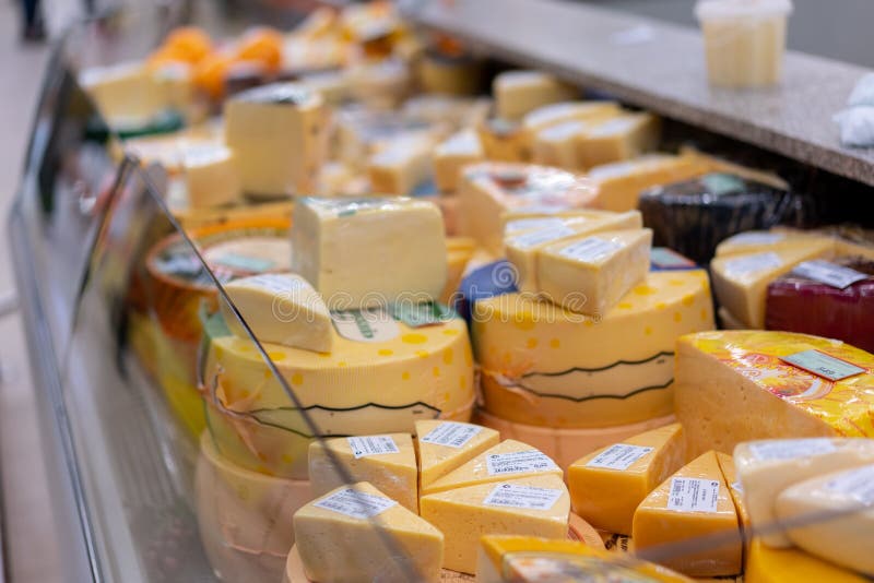 Packaged Cheeses editorial stock image. Image of supermarket - 38784784