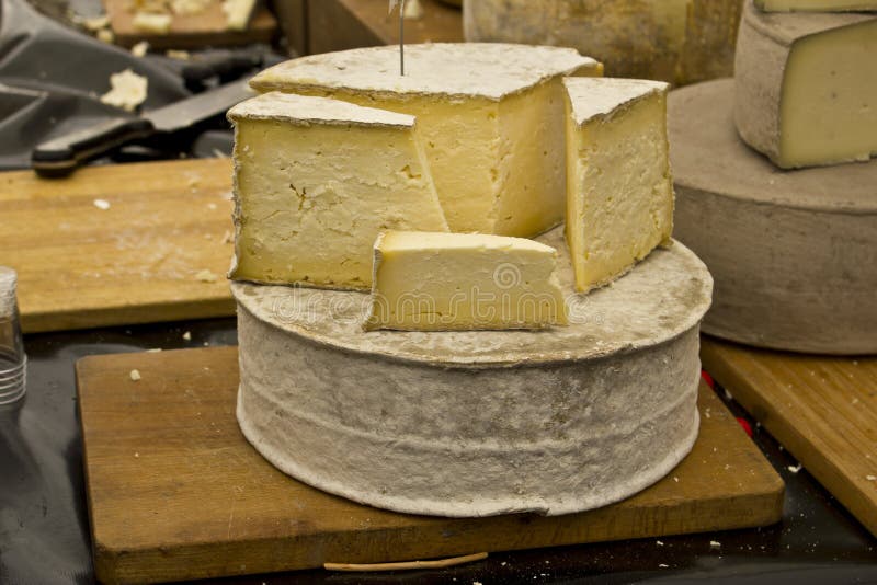 Cheeses at a Fair stock photo. Image of french, wooden - 71675938
