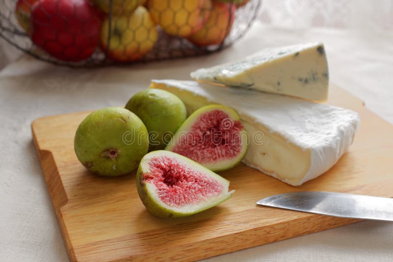 Cheese and figs stock photo. Image of leaf, figs, swiss - 18205272