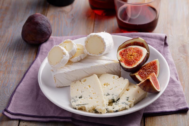 Cheese and figs stock photo. Image of leaf, figs, swiss - 18205272