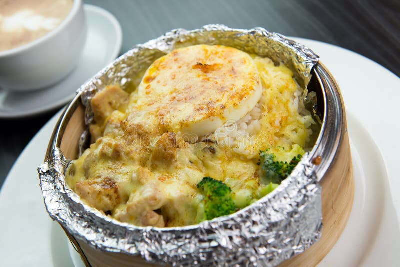 Cheesy bakes rice stock photo. Image of cooked, forl - 48588028