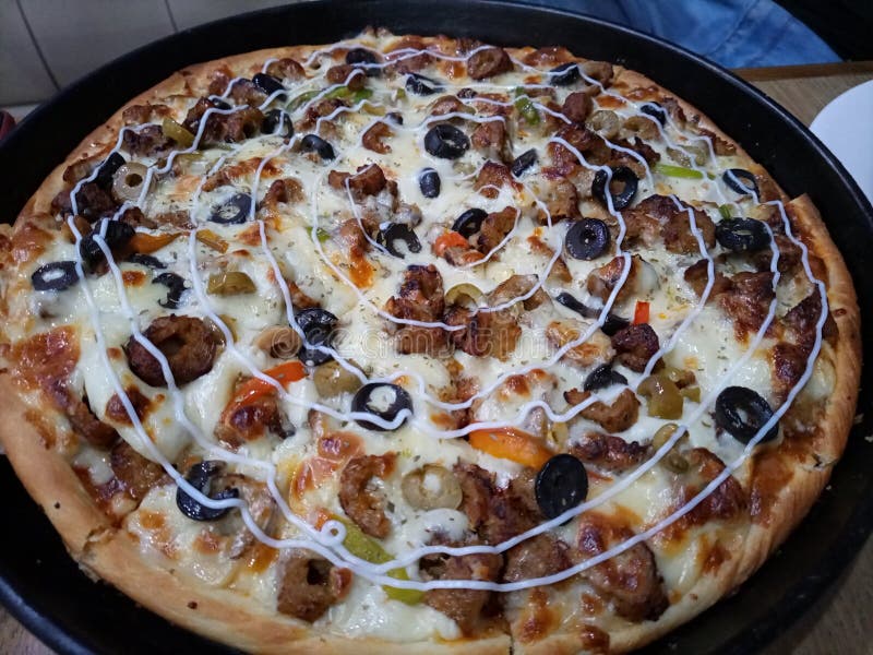 Cheesy crust pizza stock photo. Image of food, pizza - 243369058