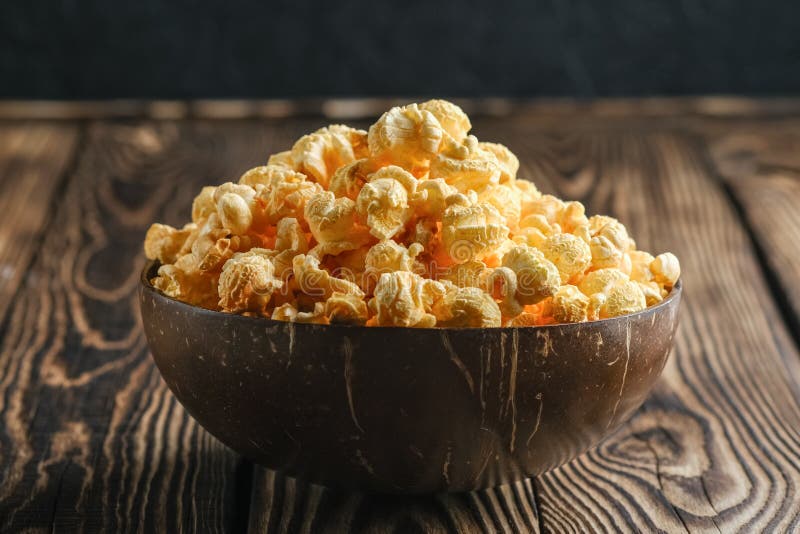 Cheesy Popcorn In A Coconut Bowl Stock Image - Image of object, salty ...