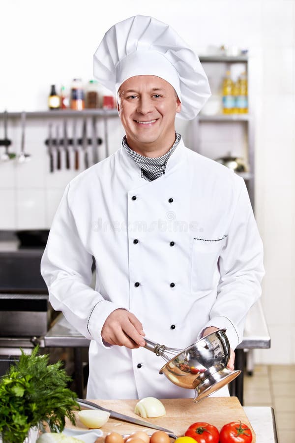 Chef is Posing for the Camera Stock Image - Image of cook, worker: 1012299