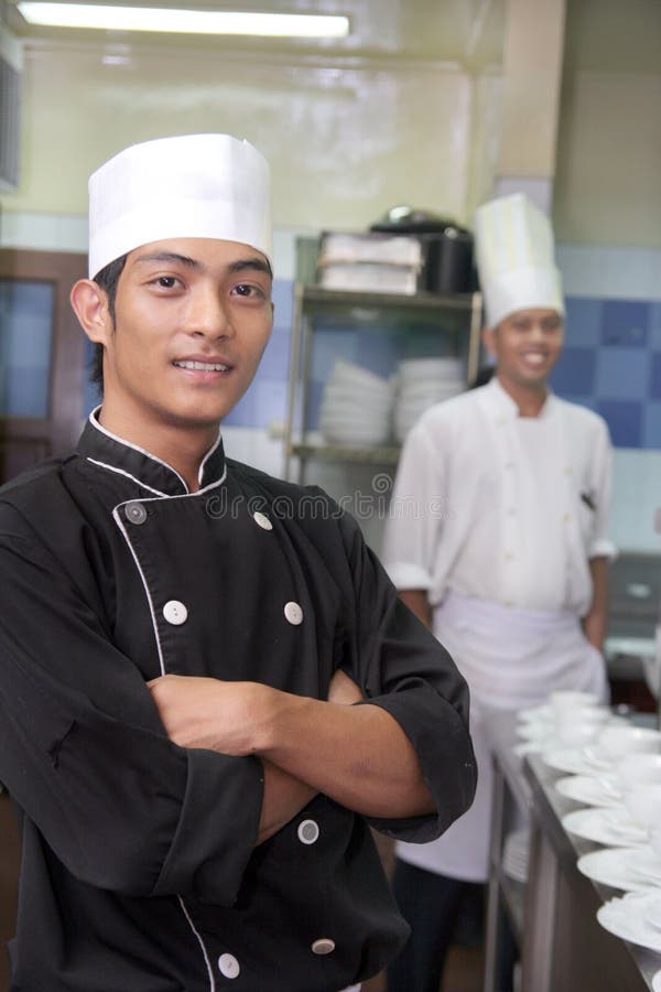Receptionist Greeting Man at Front Desk Stock Image - Image of woman ...