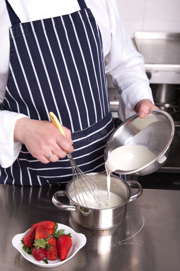 Chef cooking in kitchen stock photo. Image of professional - 2107230