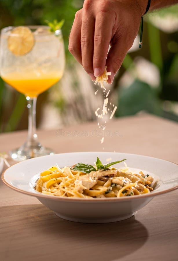 Chef Adding Cheese To Pasta Stock Photo - Image of italian, gourmet ...
