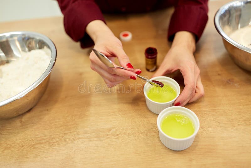 Chef Adding Food Color into Bowl with Egg Whites Stock Photo - Image of ...