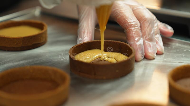 Chef Adding Melted Chocolate in Piping Bag To the Baked Cookies on a ...