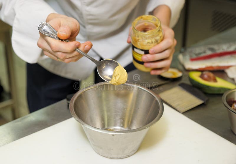 Chef is Adding Mustard in Sauce Stock Image - Image of person, shiny ...