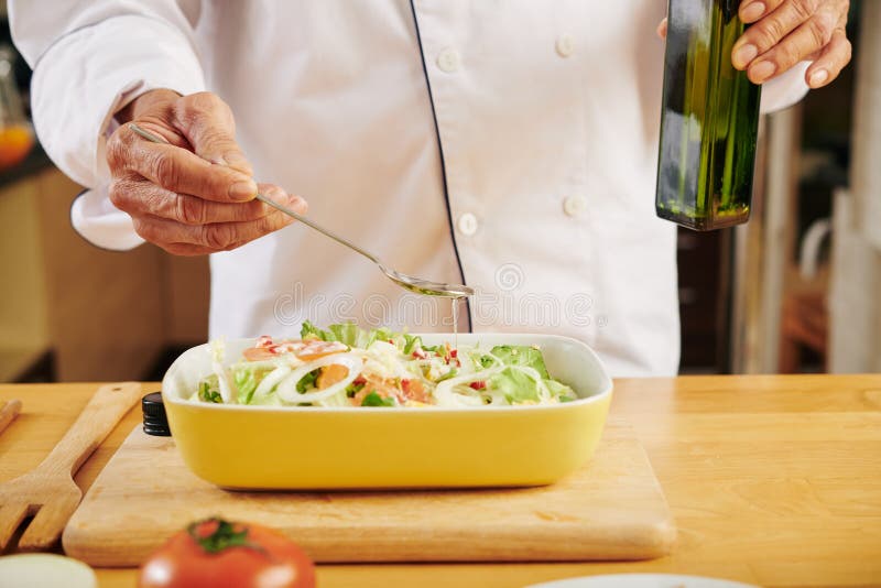 Adding oil in salad stock photo. Image of nutrition - 134267534