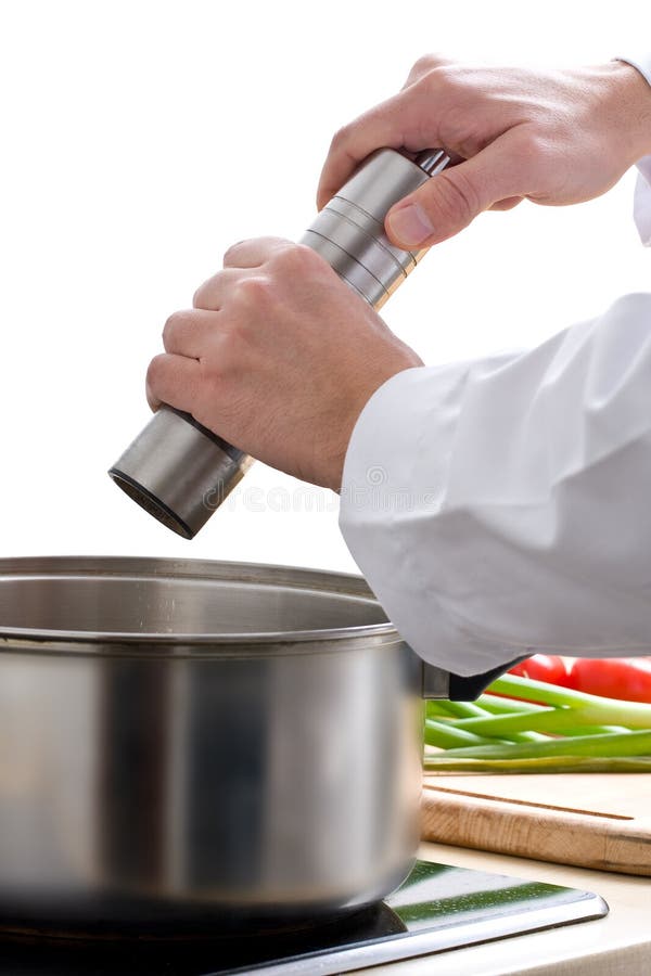 Chef adding pepper stock photo. Image of inside, cook - 22490868