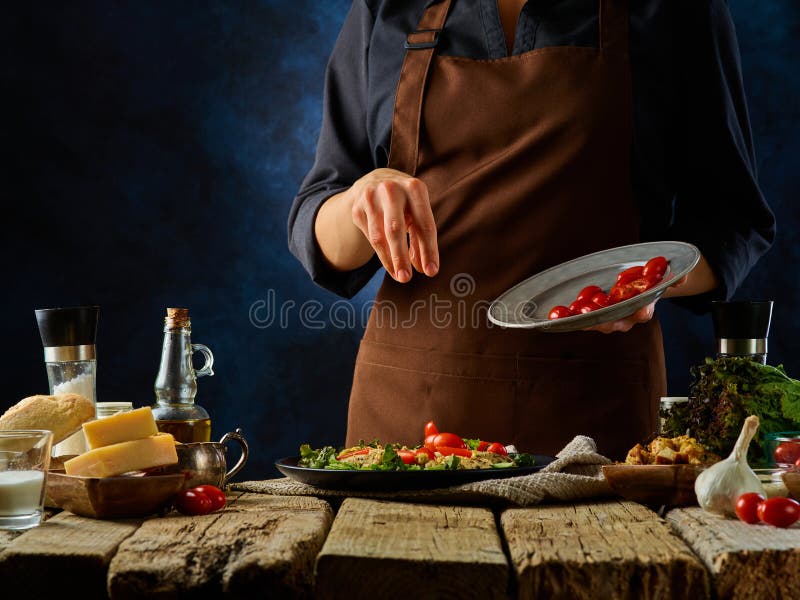 The Chef Adds Cherry Tomatoes To the Caesar Salad. the Ingredients for ...