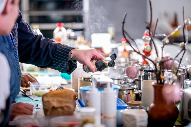 Chef Adds Sauce To Saucepan. Master Class in the Kitchen. the Process ...