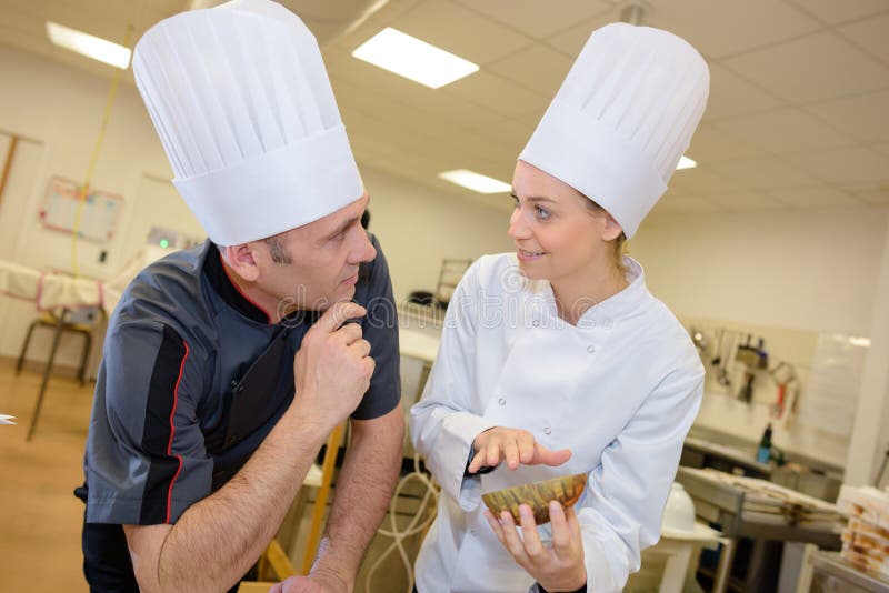 Chef and apprentice stock photo. Image of teacher, teach - 100303210